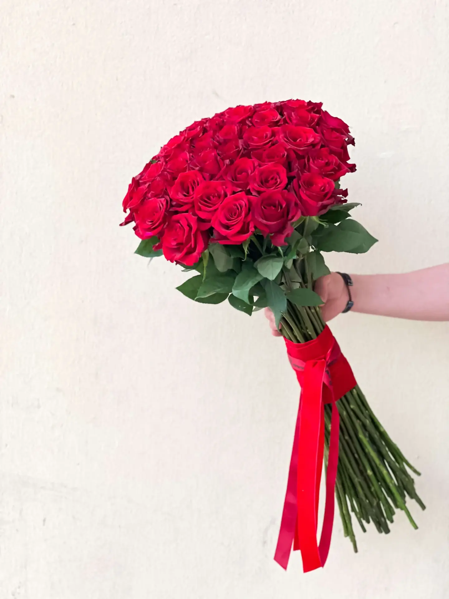Grand Red Roses Hand Bouquet with Satin Ribbon - Rawana Flowers